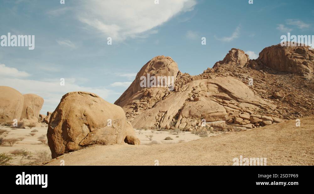 Colorful footage of the desert with big rocks in Namibia, blue sky, 4k ...