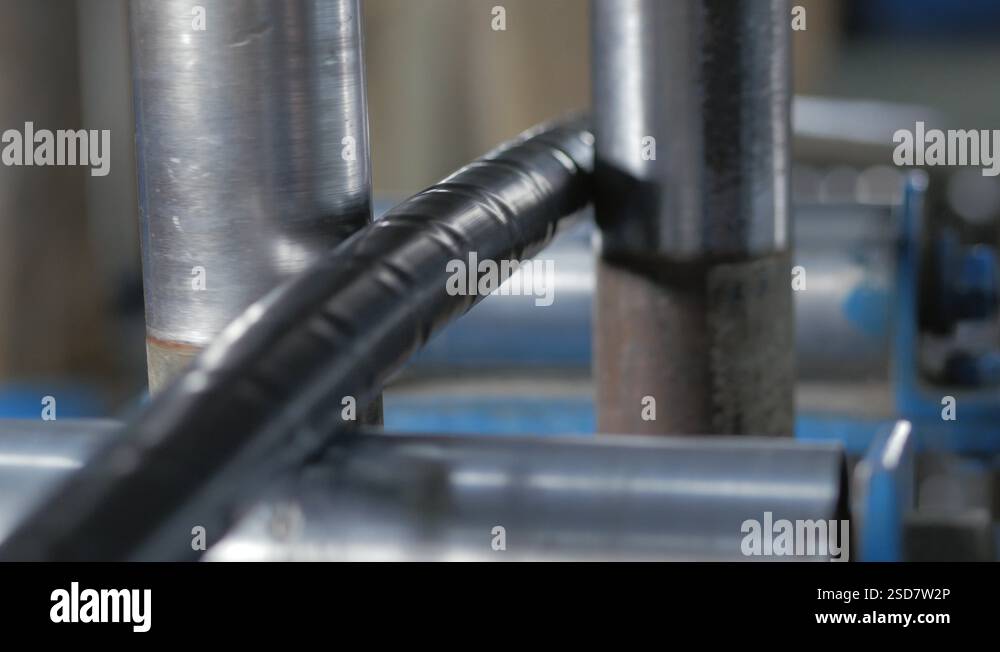 Plant for the production of the cable. Covering the copper cable with a ...