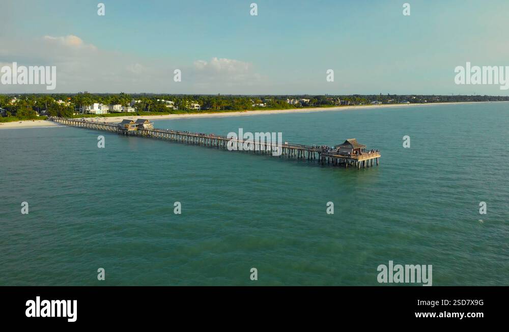 Naples Beach Pier 4k aerial drone footage Stock Video Footage - Alamy