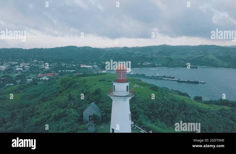 Cinematic aerial drone video of a romantic lighthouse of Basco Batanes ...