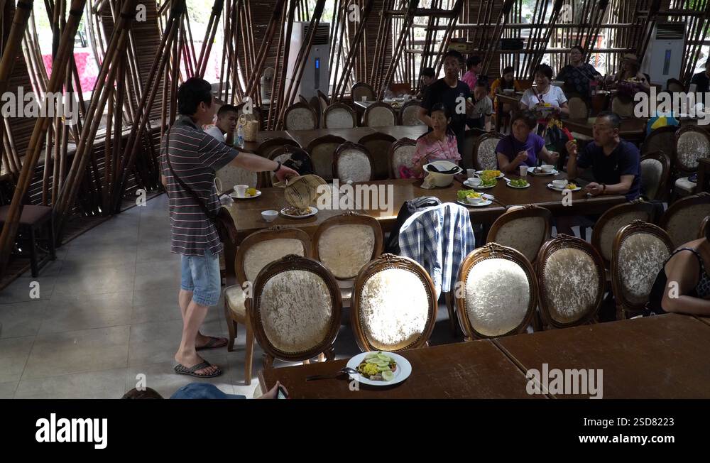 Luxury resort on a tropical island. A crowded restaurant buffet. Travel ...