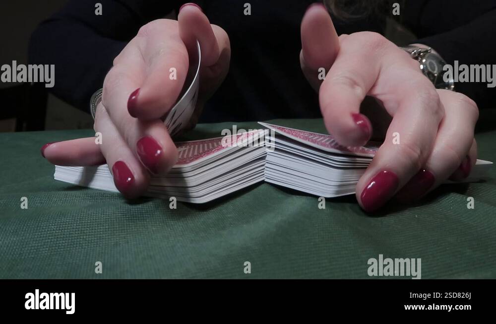 Riffle Shuffle. Women's hands shuffling the cards. Close-up, real time ...