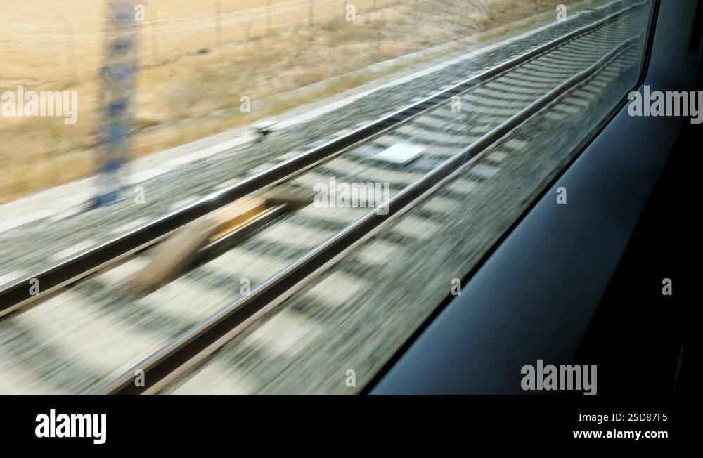 View from the window of fast train. Bullet train rides on the railway ...