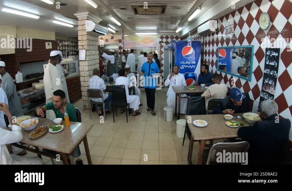 Saudi people eating Stock Videos & Footage - HD and 4K Video Clips - Alamy