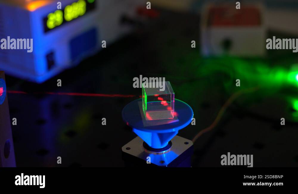laser in a quantum optics lab. Semiconductor laser on optical table in ...