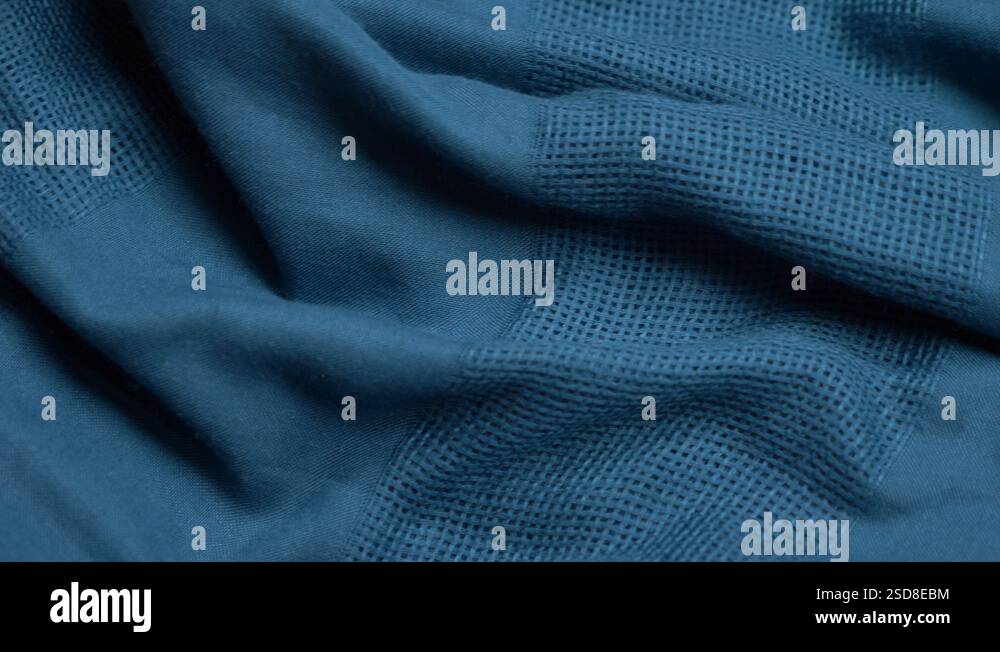 background texture fabric. the folds of a blue cotton fabric. copy ...