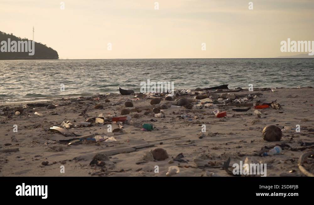 an empty paradise beach full of plastic trash that has been washed up ...
