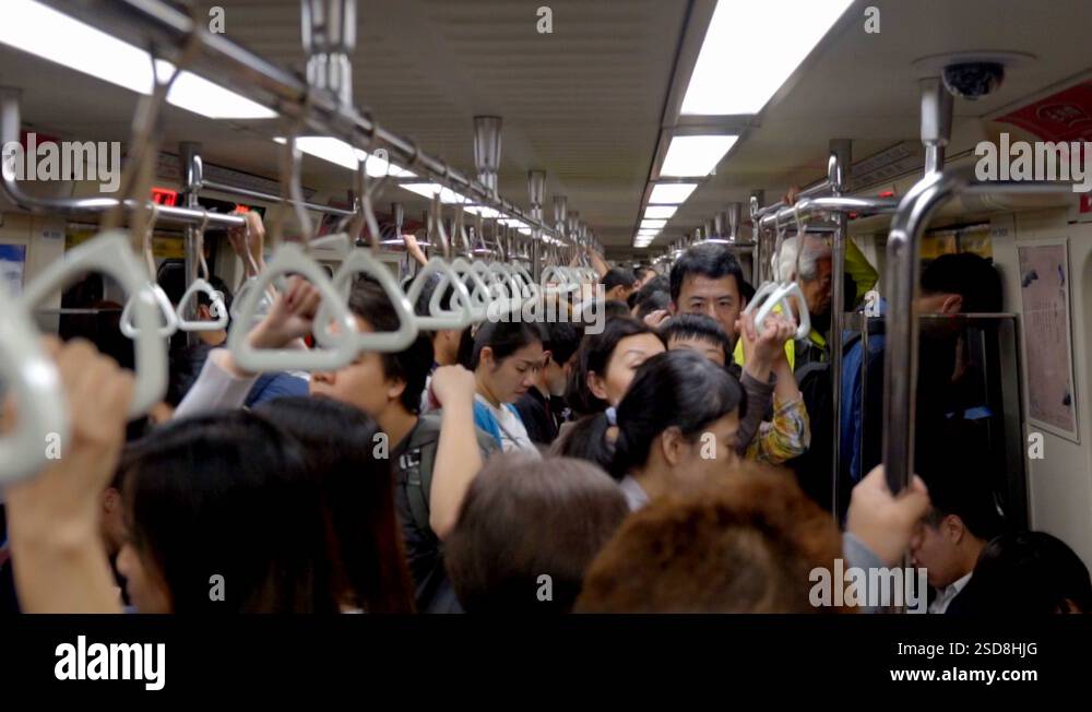 Standing Passengers Slightly Moving While Holding On The Hanging ...