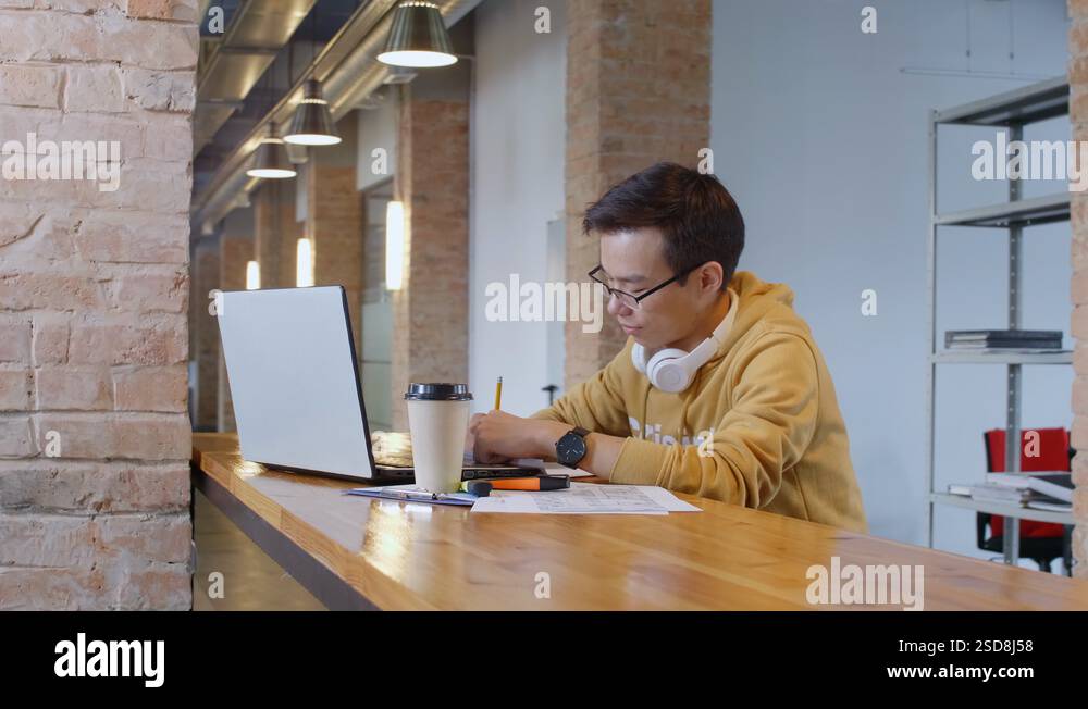Young Asian Man Drawing Sketch with Pencil at Desk in Loft Office Stock ...