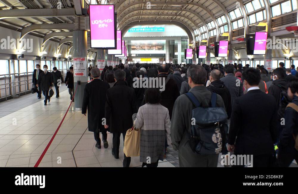 TOKYO, JAPAN : Crowd of people walking. Commuters going to work. Zoom in shot Stock Video ...