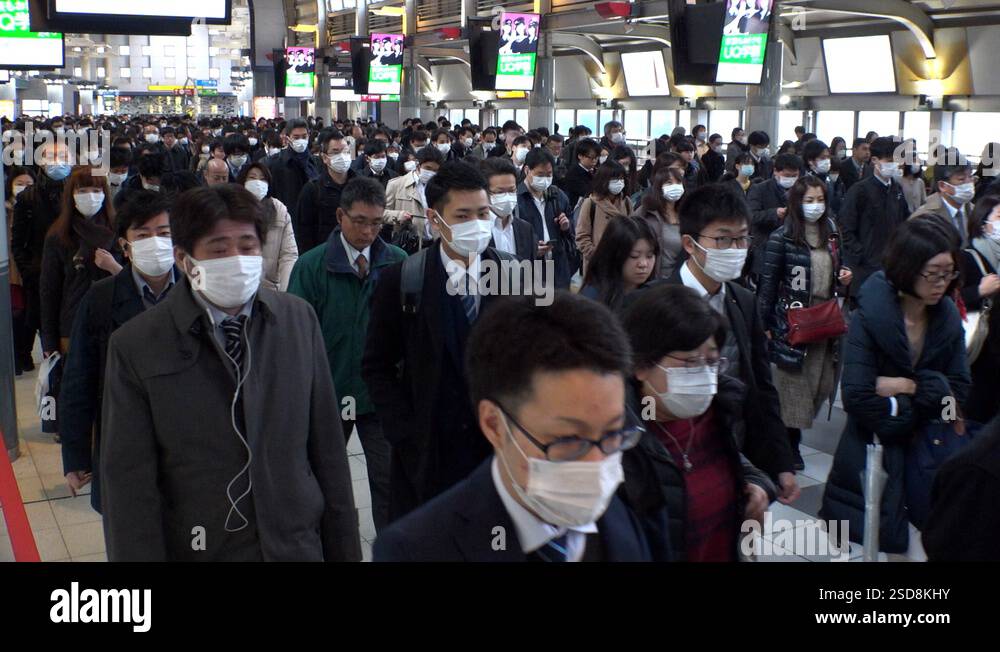 JAPAN : Crowd of people wearing mask to protect from Coronavirus. Slow ...