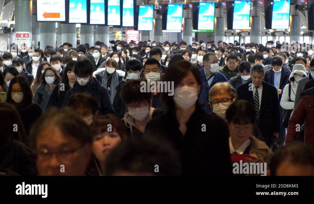 JAPAN : Crowd of people wearing mask to protect from Coronavirus. Slow ...