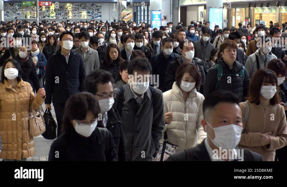 JAPAN : Crowd of people wearing mask to protect from Coronavirus. Slow ...