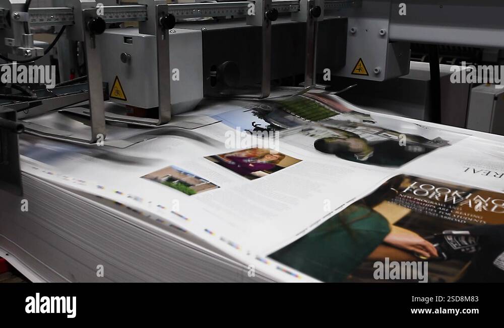 close shot of fast moving color magazine print press Stock Video ...