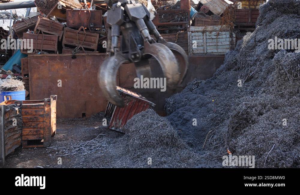 Collecting and storing scrap metal shavings at recycling center Stock ...