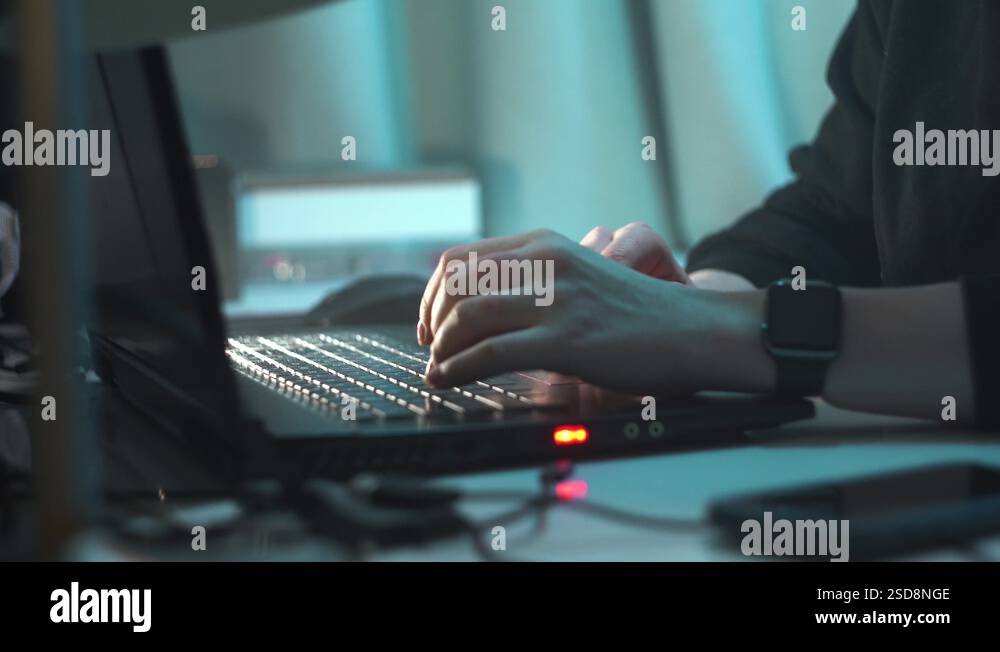 close up footage of hands of hacker girl who is typing on computer ...
