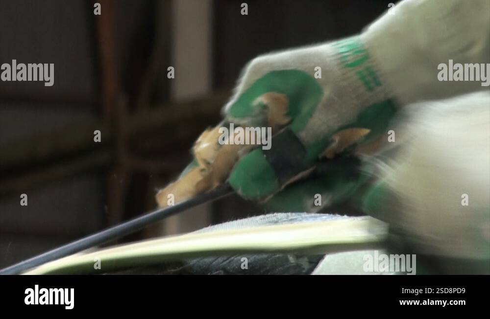 Factory worker clearing bamboo of sharp edges in Kyoto, Japan Stock ...