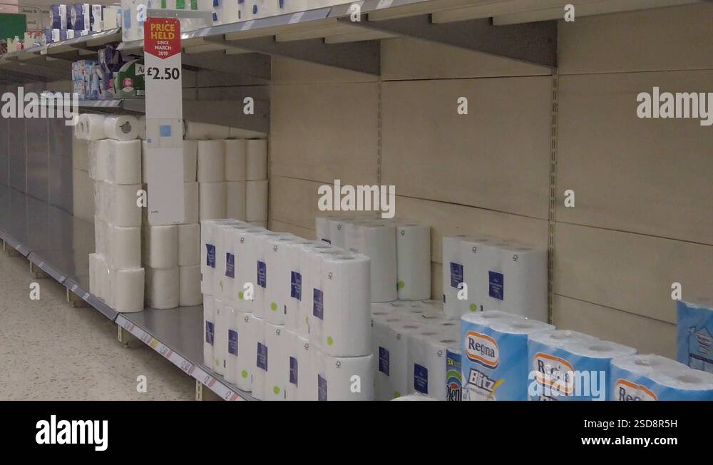 Slow motion interior empty shelf UK supermarket panic buying toilet ...