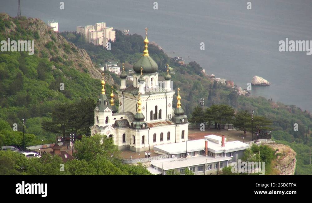 White Foros Church on sheer cliff. Observation deck at Bayder Gate ...