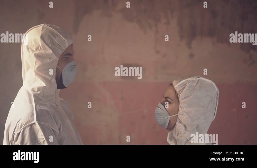 Video of two doctor scientists wearing bio hazard suit and gear to ...