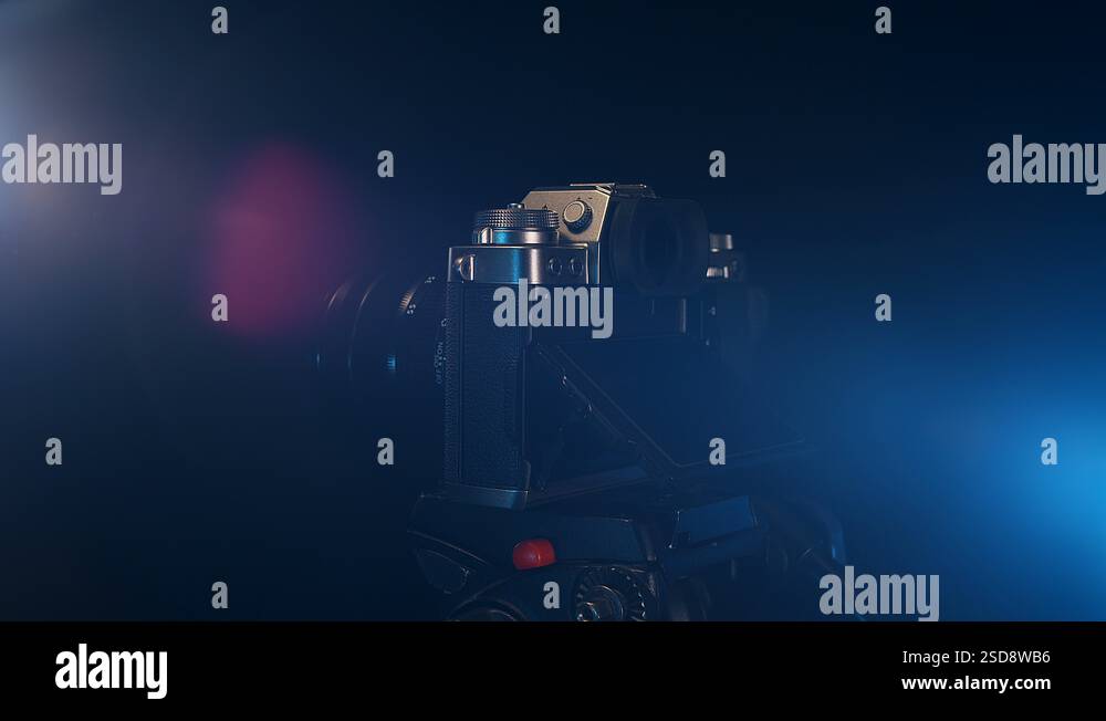 Camera panning at tripod at black background isolated Stock Video ...