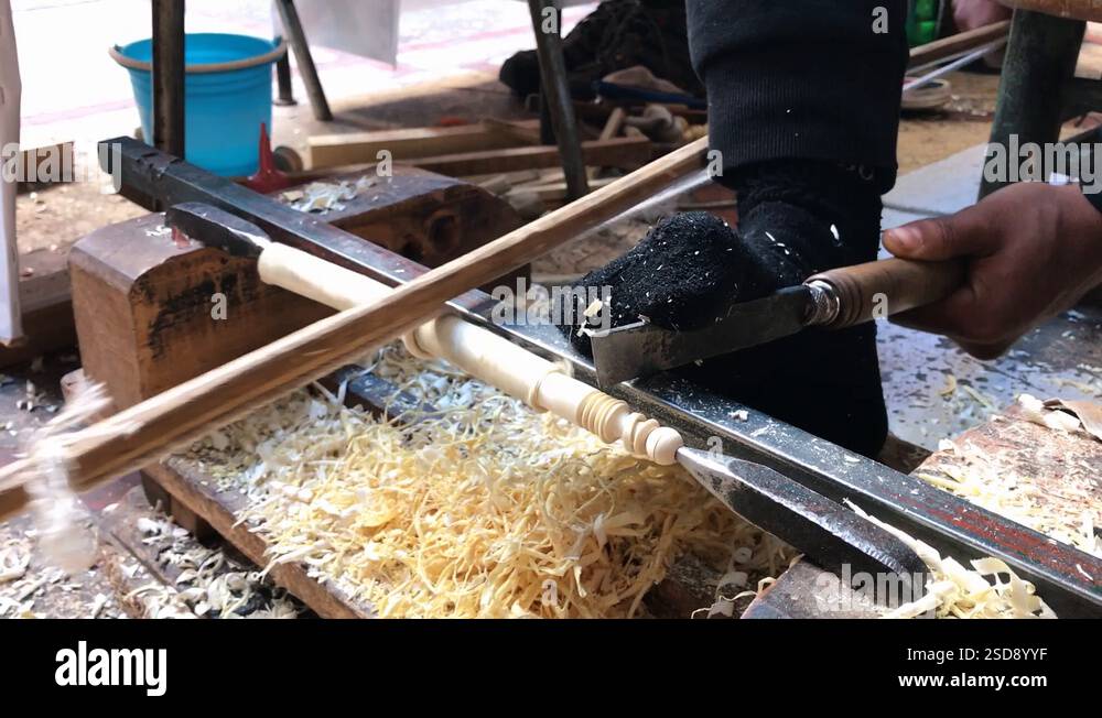 wood hand bow powered lathe holding by feet cultural carving heritage ...
