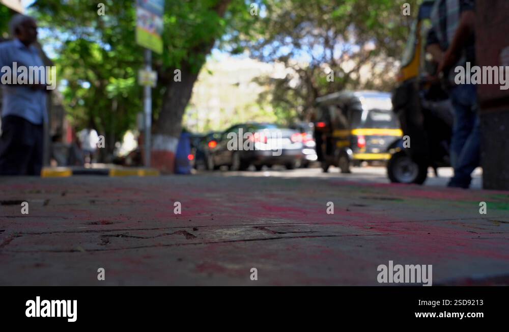 Pavement footpath in Mumbai India covered with colors after the ...