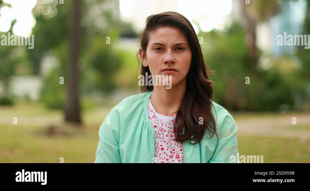 Woman annoyed making stop sign with hand, saying no, expressing defense ...