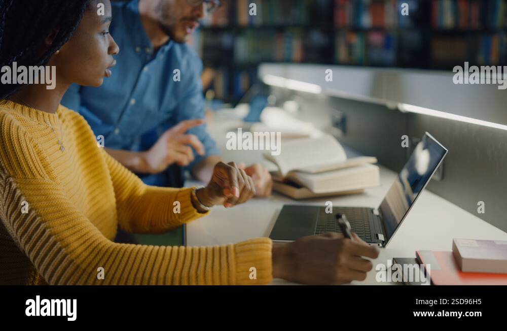 University Library: Gifted Black Girl uses Laptop, Smart Classmate ...