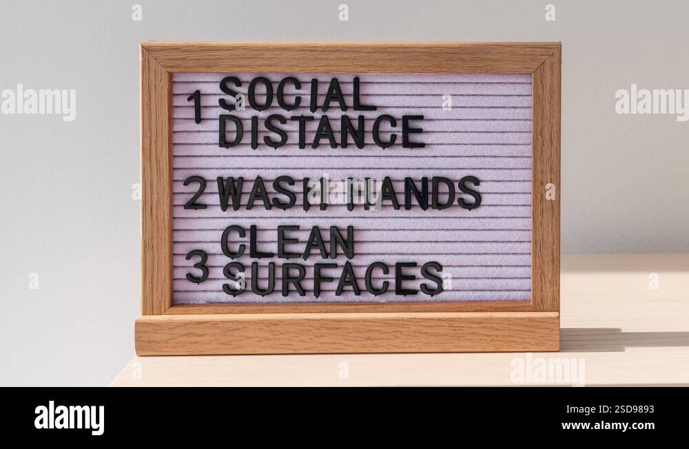 COVID-19 Coronavirus health safety guidelines. Text board in public ...