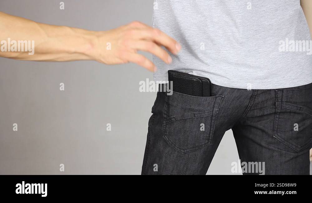 pickpocket try to steal wallet, puts on handcuffs, hand is shaking in ...