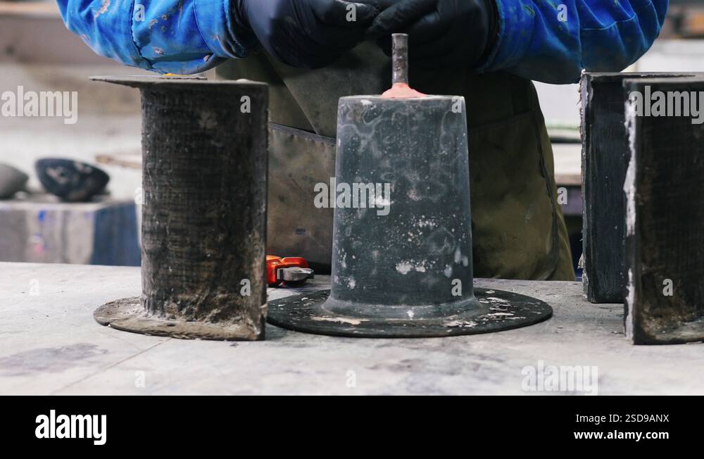 Concrete workshop - Man working with a concrete in the workshop ...