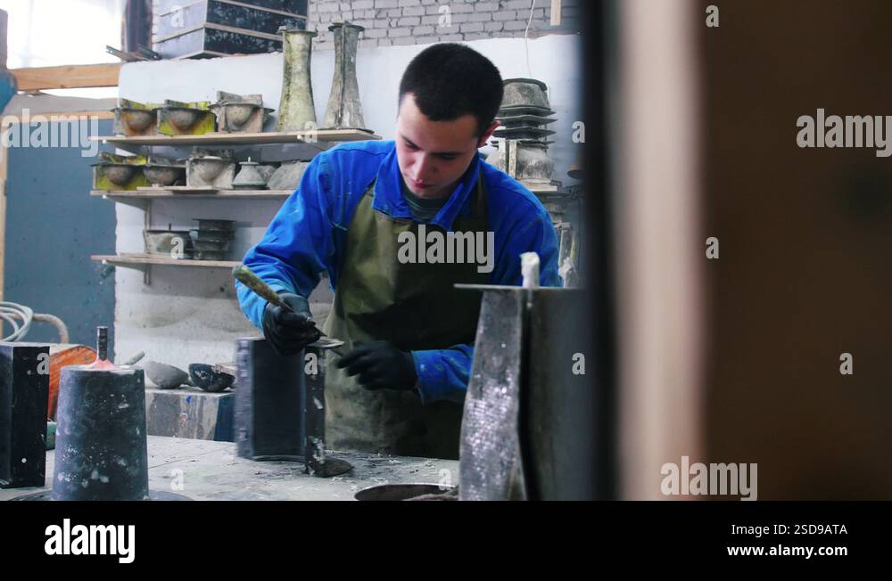 Concrete workshop - Man working with a concrete in the workshop ...