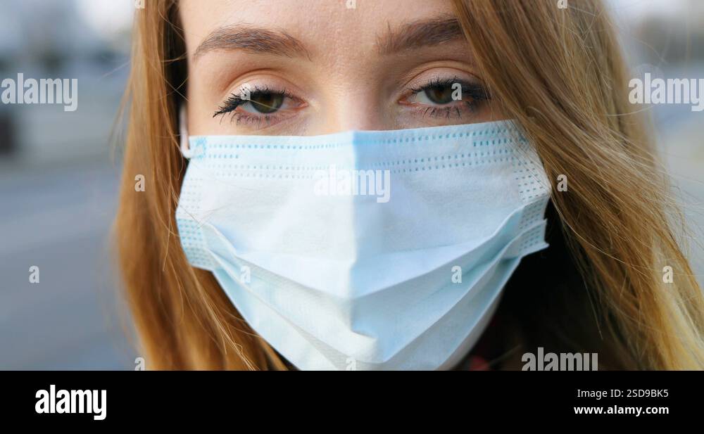 Close up of face of Caucasian young beautiful woman with respiratory ...
