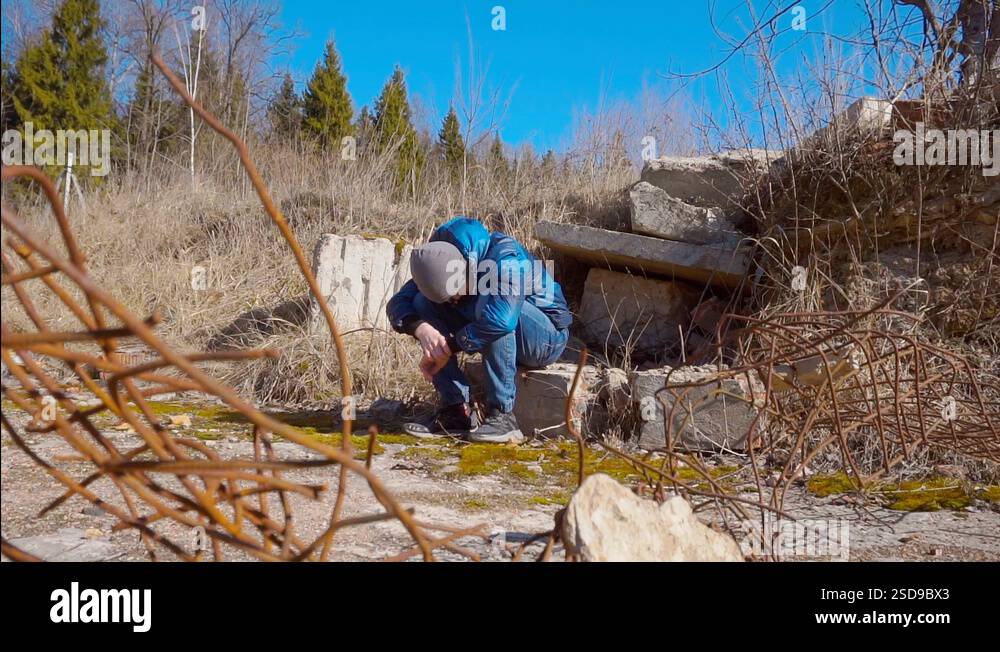 sad child of school age sits in a depressive pose Stock Video Footage ...