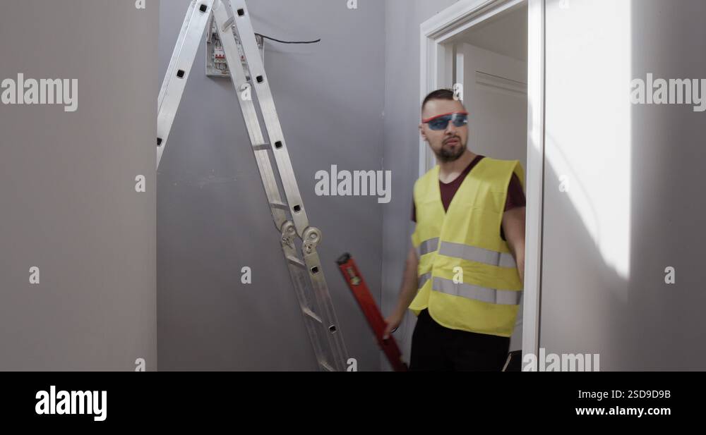 Inspector checks the quality of the works and makes notes in the ...