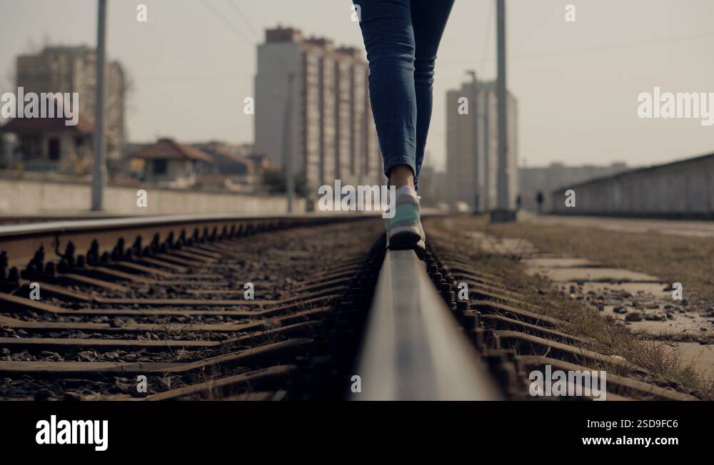Tourist Legs Walking On Railway. Woman Feet Railroad Tracks Rails Stock ...