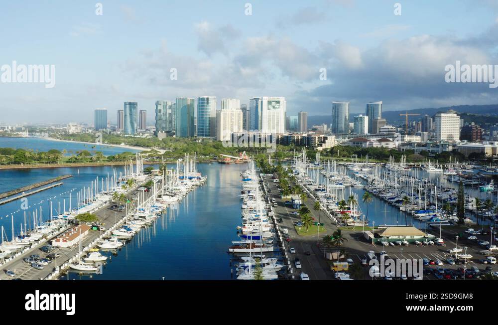 Cinematic aerial of Honolulu in Oahu island, the capital of Hawaii ...