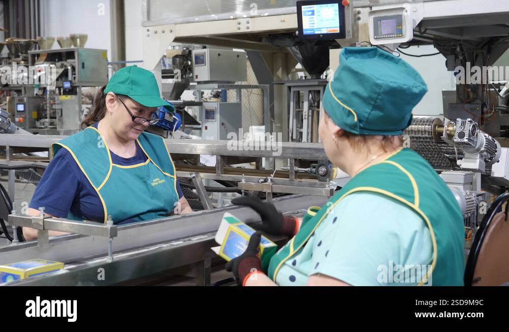 Tea factory workers are engaged in the packaging of tea Stock Video ...