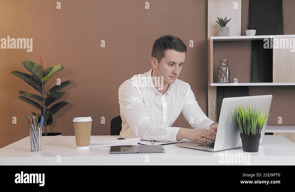 Happy moments at work. A happy man is a businessman, gets good news in ...