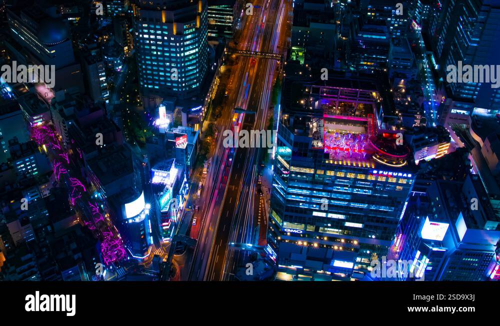 A night timelapse of the neon town in Shibuya Tokyo high angle wide ...