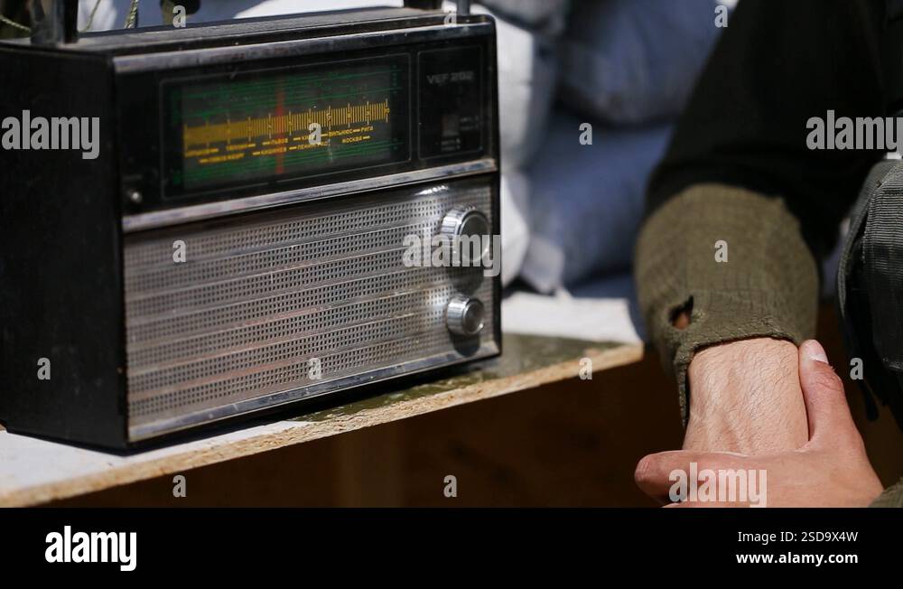 Person turned on the radio and began channel-surfing. Adjusts the sound ...