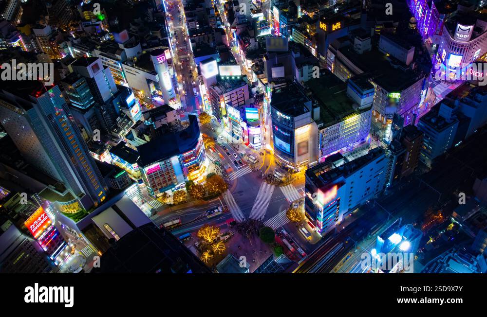 A night timelapse of the neon town in Shibuya crossing high angle wide ...