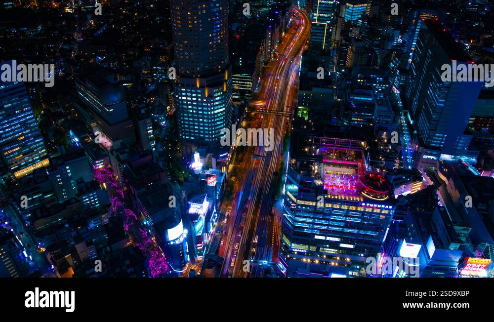 A night timelapse of the neon town in Shibuya Tokyo high angle wide ...