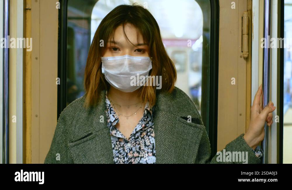 Asian Woman Portrait. Masked Human. People Asia. Subway Metro Stock ...