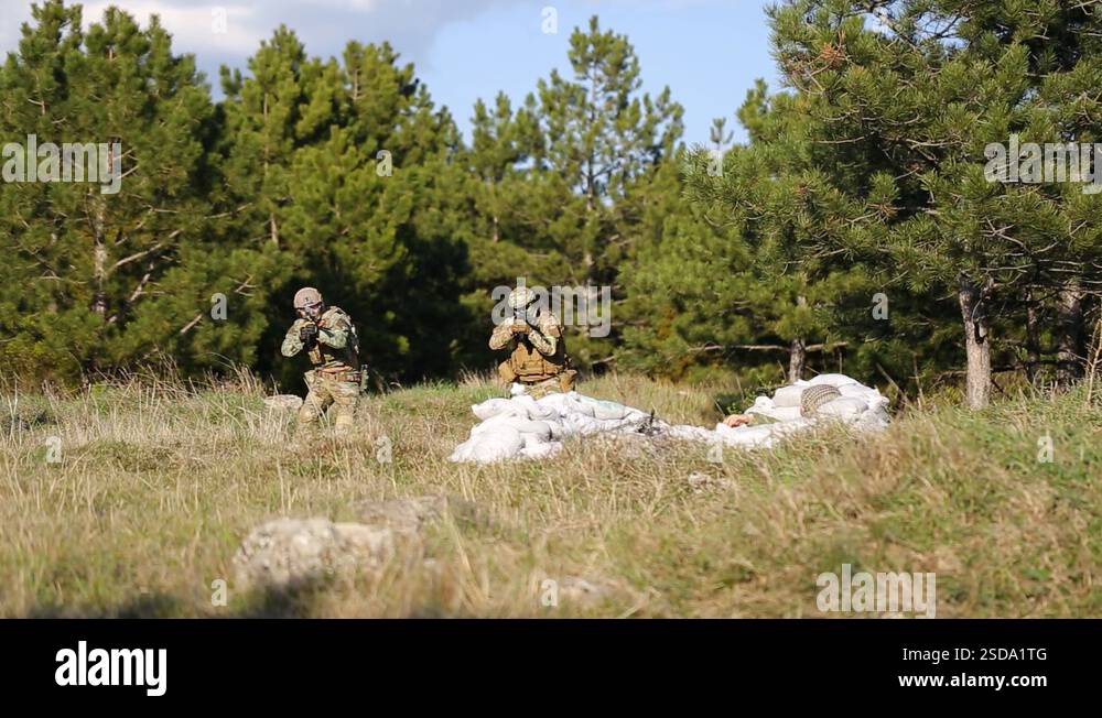 Fully equipped soldiers on military operation. Capturing radar base ...