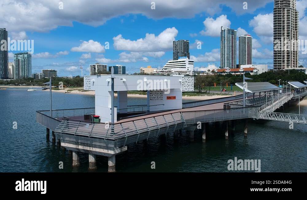Revealing aerial video of a city wharf and boat jetty located close to ...
