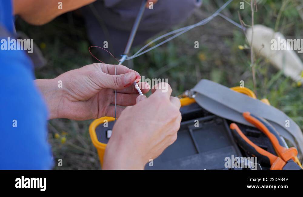 Patch cord. Soldering of optic fiber.Master of Internet service ...