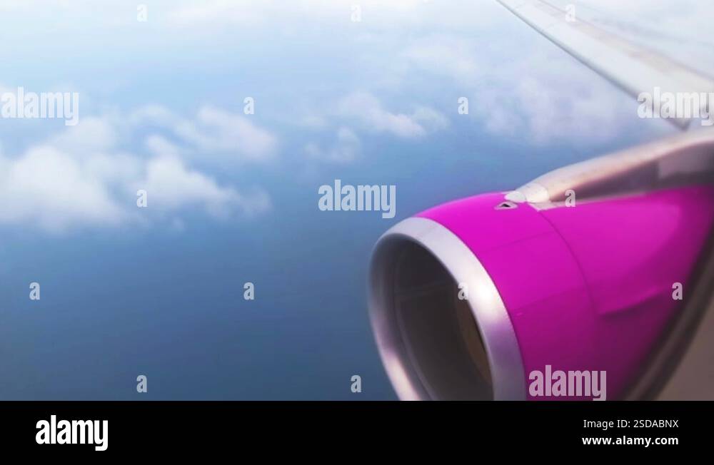 Flying through the sky in a Pink Airplane. Over the clouds of Okinawa ...
