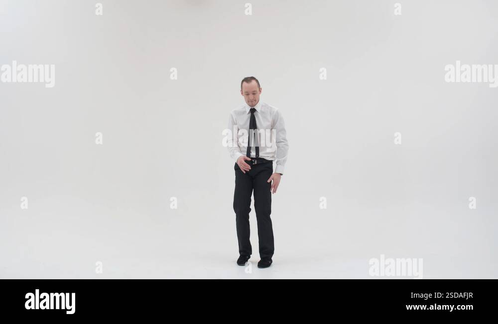 Breakdancer in office clothes dancing. The guy dances Bouncing and ...